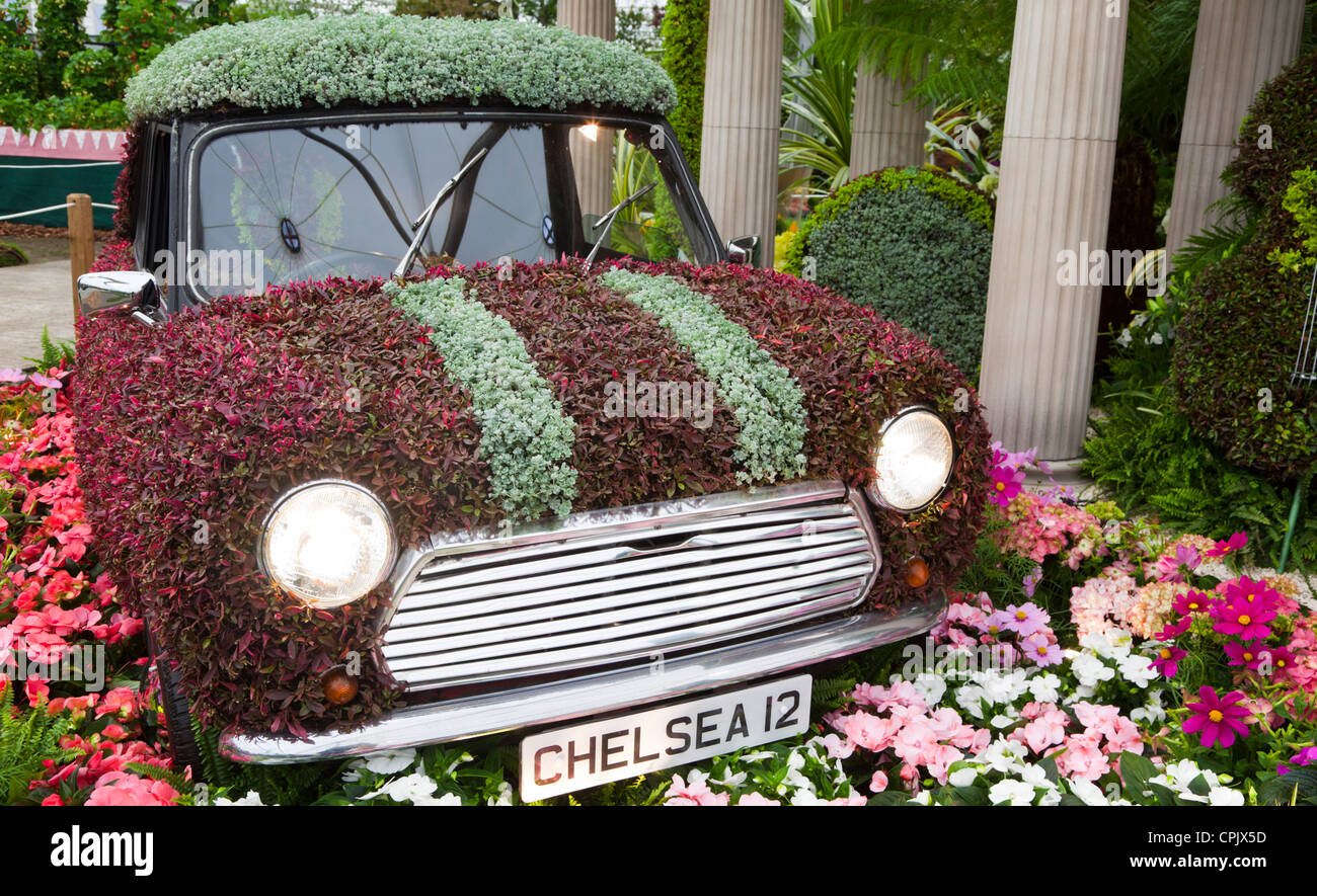 Mini Cooper car covered with plants, RHS Chelsea Flower Show, London ...