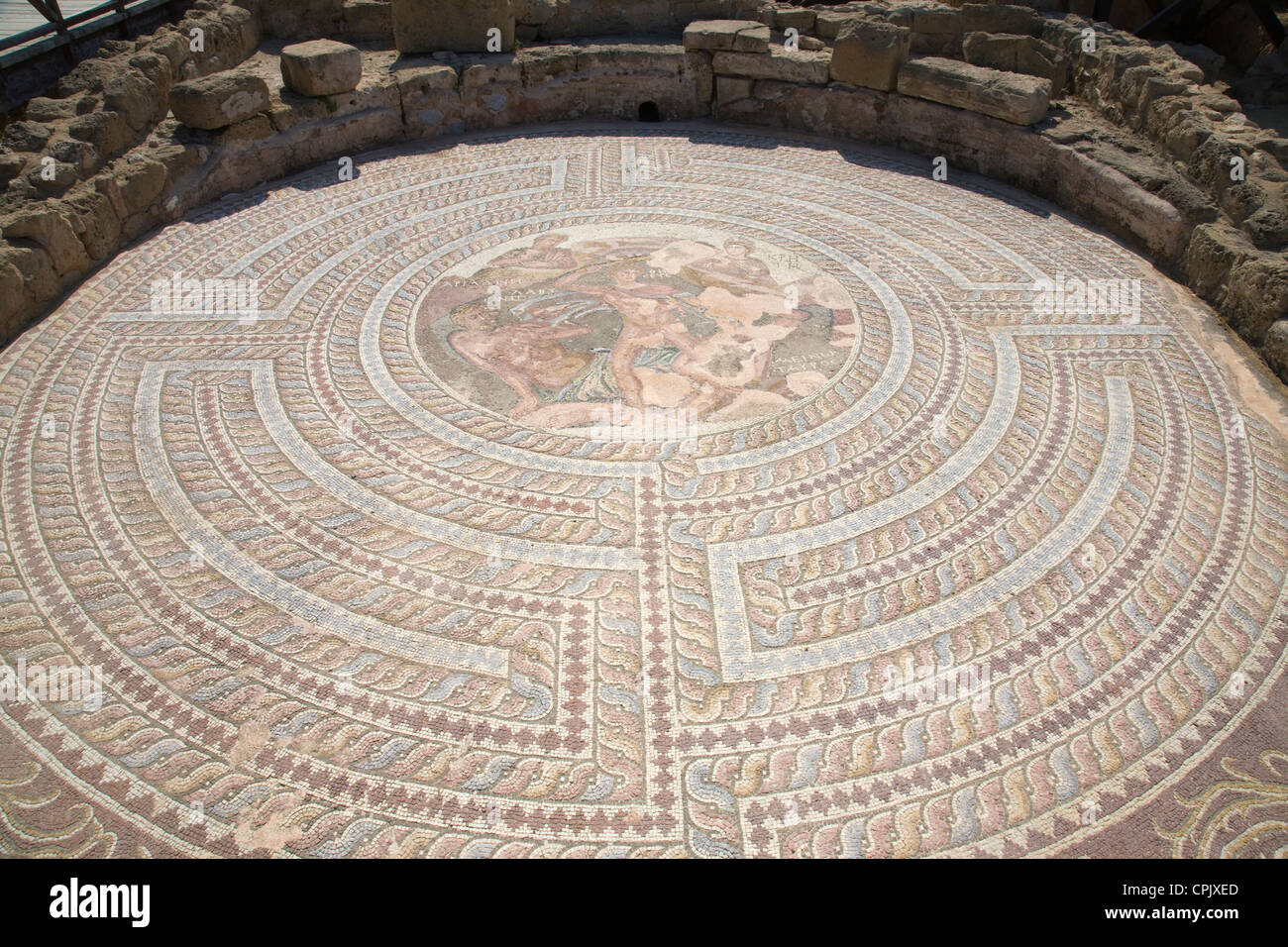 A round mosaic in the villa of Theseus in the Archaeological Park ...