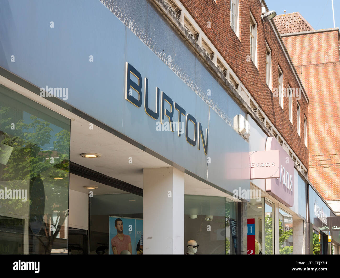 Burton shop sign on exeter high street hi-res stock photography and ...