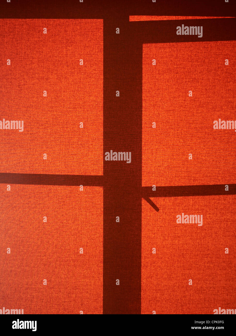 Window as seen through dark red blind Stock Photo - Alamy