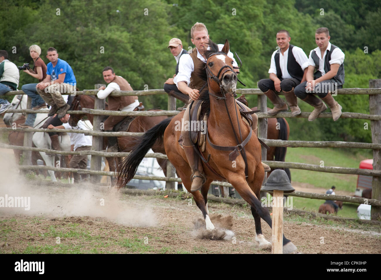 A 'Buttero' cowboy participating in a ranching tournament in Canale ...