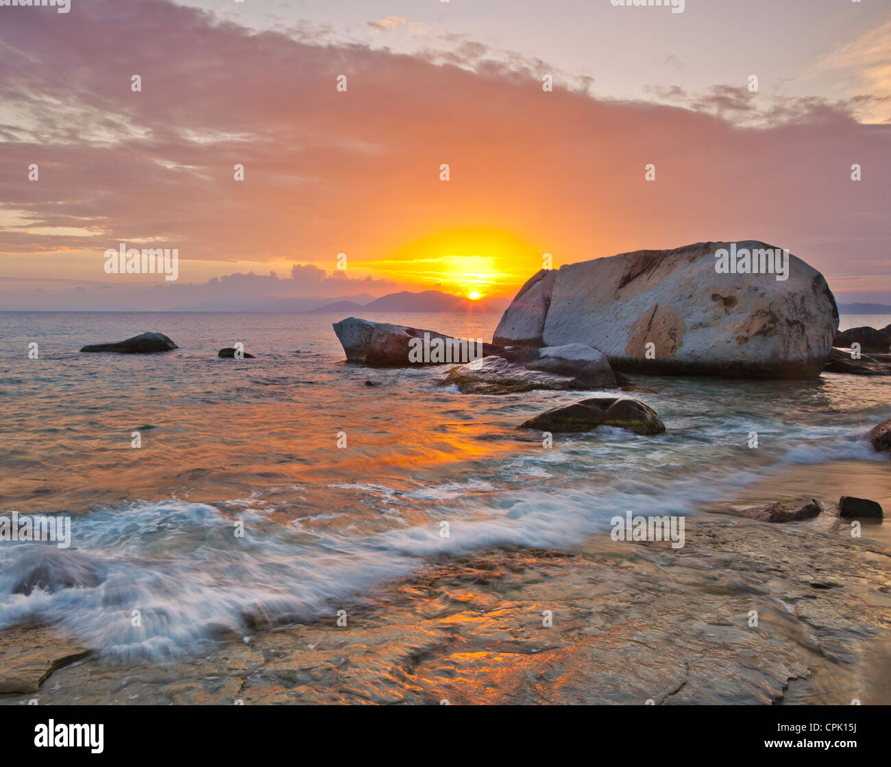 Virgin Gorda, British Virgin Islands, Caribbean Setting sun illuminates ...