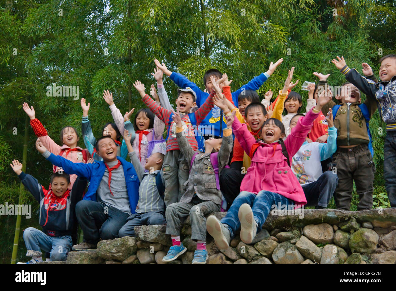 Local village children cheering, Fujian, China Stock Photo - Alamy