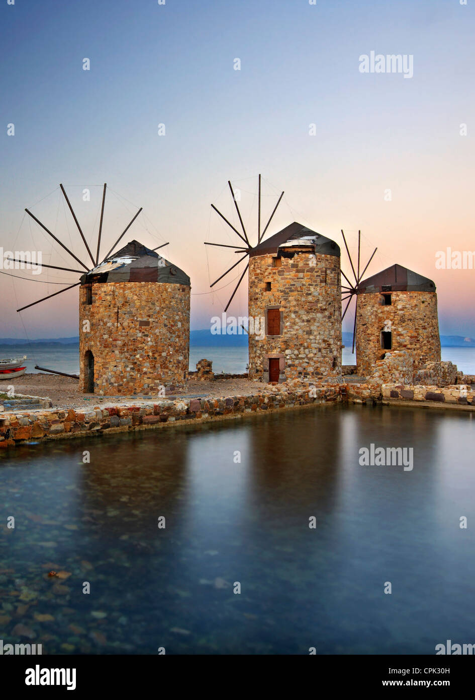 Beautiful windmills right by the sea in Chios town, Chios island ...