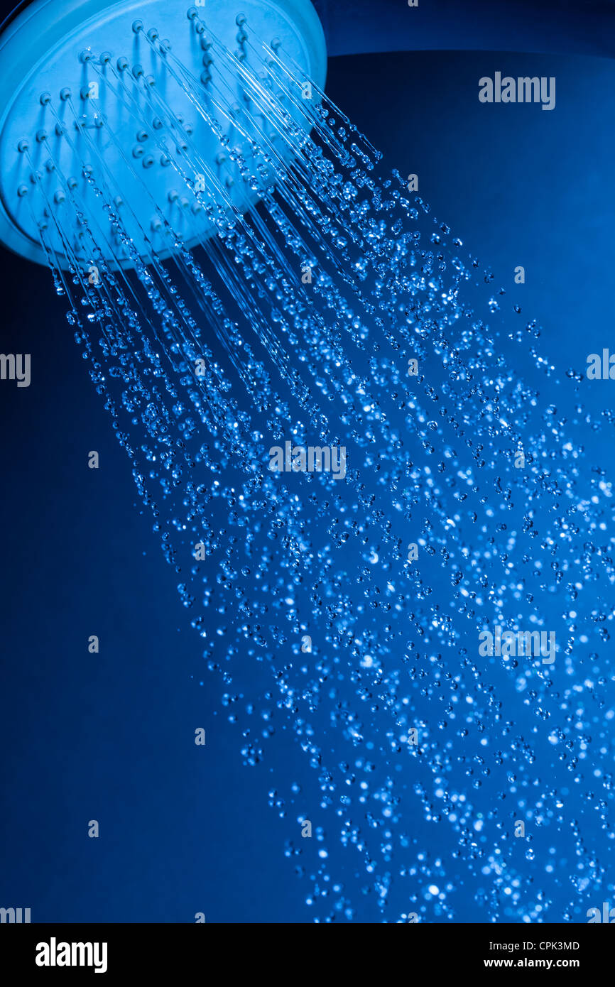 Shower Head with Running Water, Dark background Stock Photo - Alamy