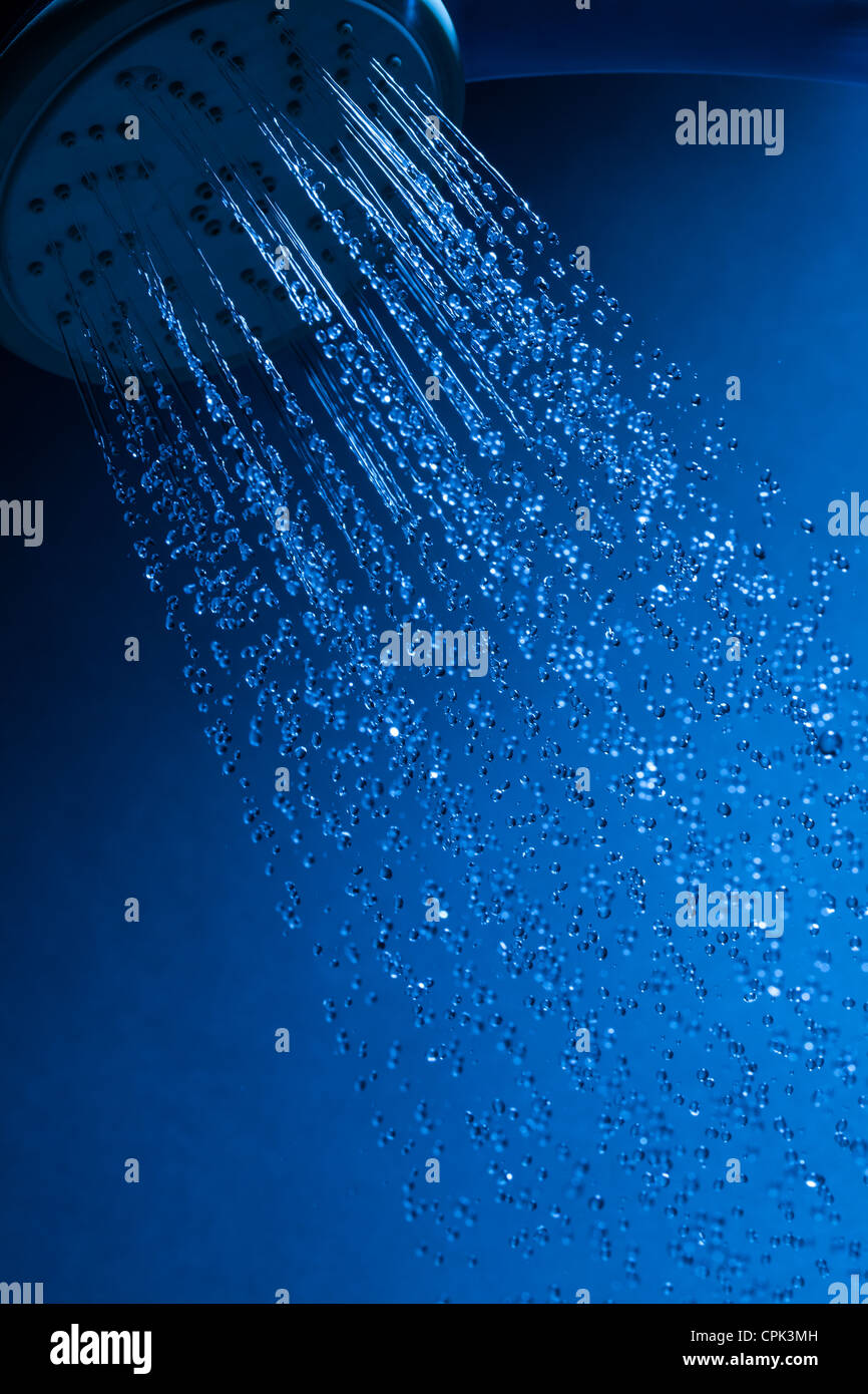 Shower Head with Running Water, Dark background Stock Photo - Alamy