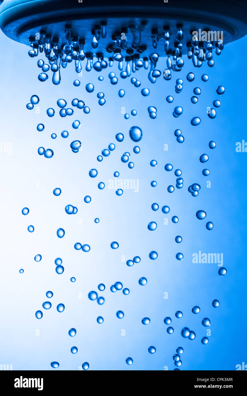 Shower Head with Droplet Water, Blue background Stock Photo - Alamy