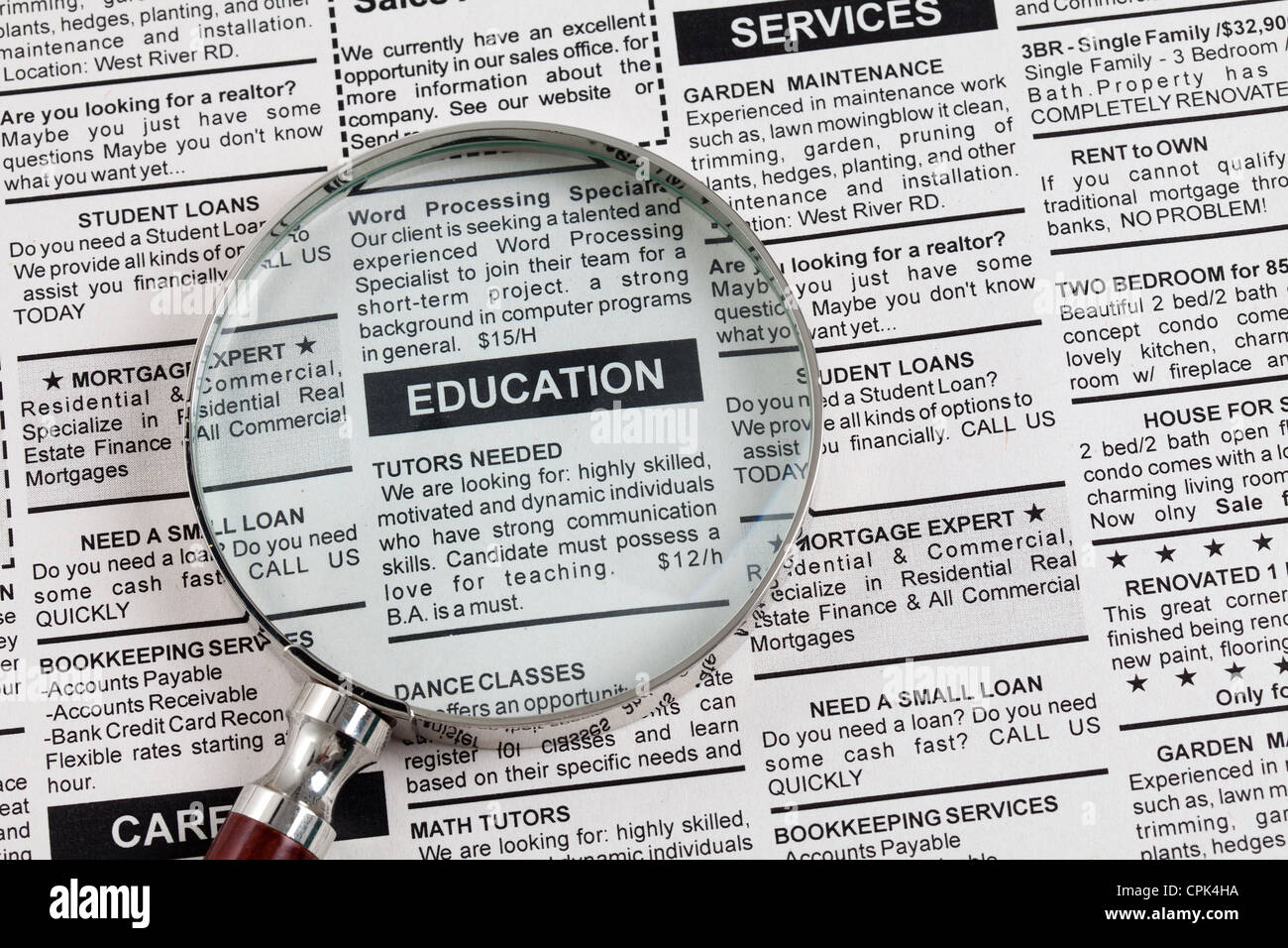 Fake Classified Ad, newspaper, business concept Stock Photo - Alamy