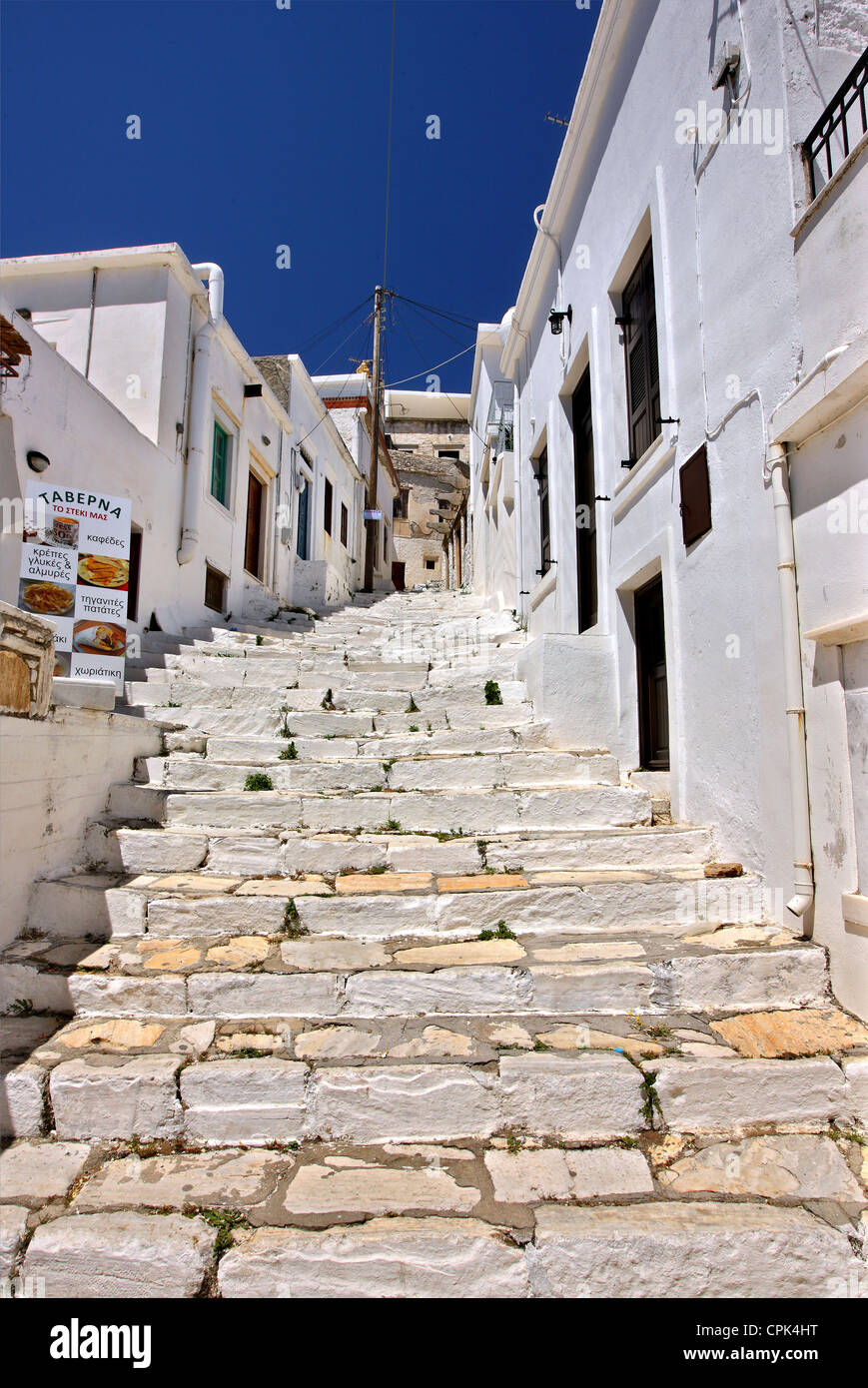 Picturesque alley in Apiranthos village, one of the most beautiful ...