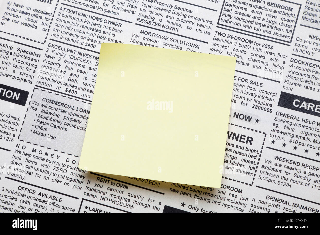 Fake Classified Ad, newspaper and sticky note Stock Photo - Alamy