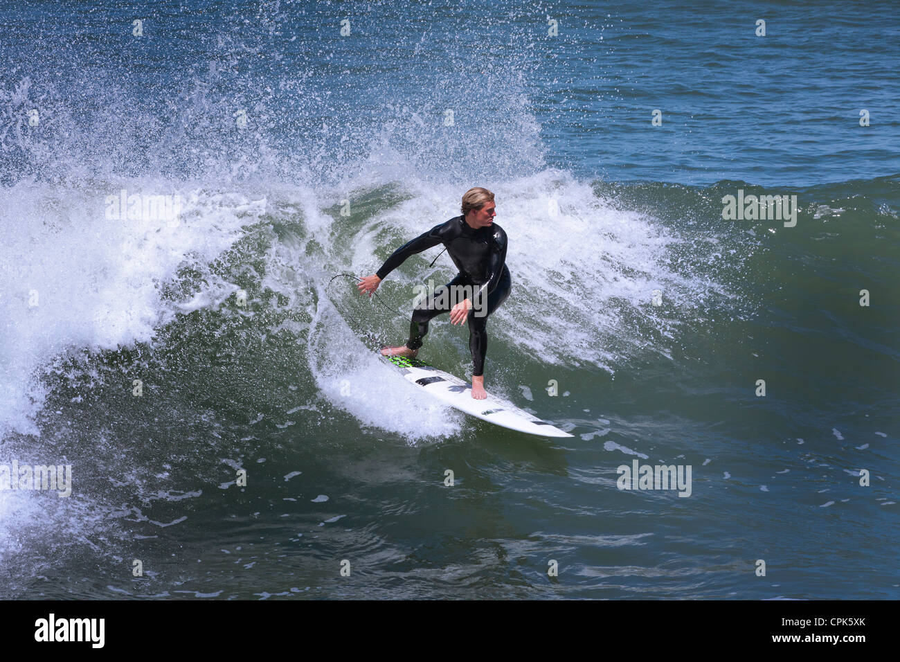 Riding a wave hi-res stock photography and images - Alamy