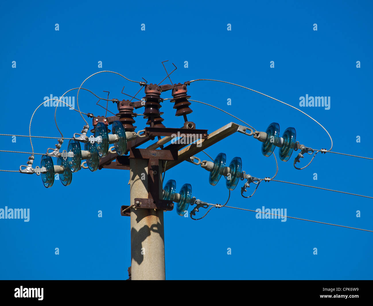 electric power lines and the post Stock Photo - Alamy