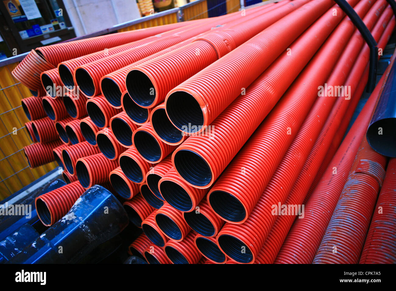 Scenes of Brussels downtown, red pipes in a street Stock Photo - Alamy