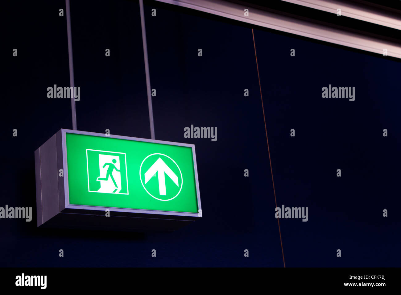 Emergency exit sign in modern offices inside an industrial plant Stock ...