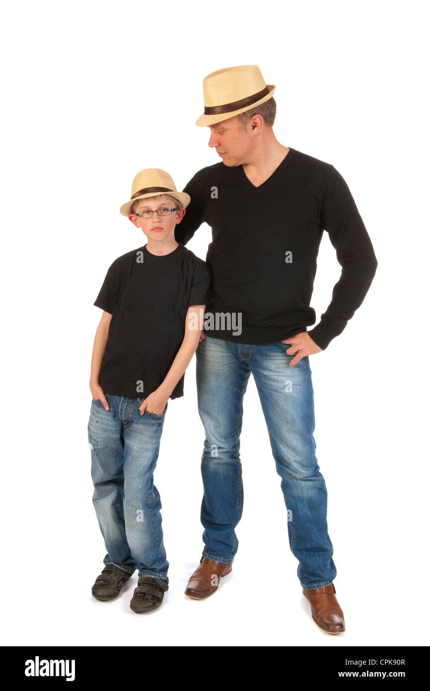 Father and son posing with straw hats in studio Stock Photo - Alamy