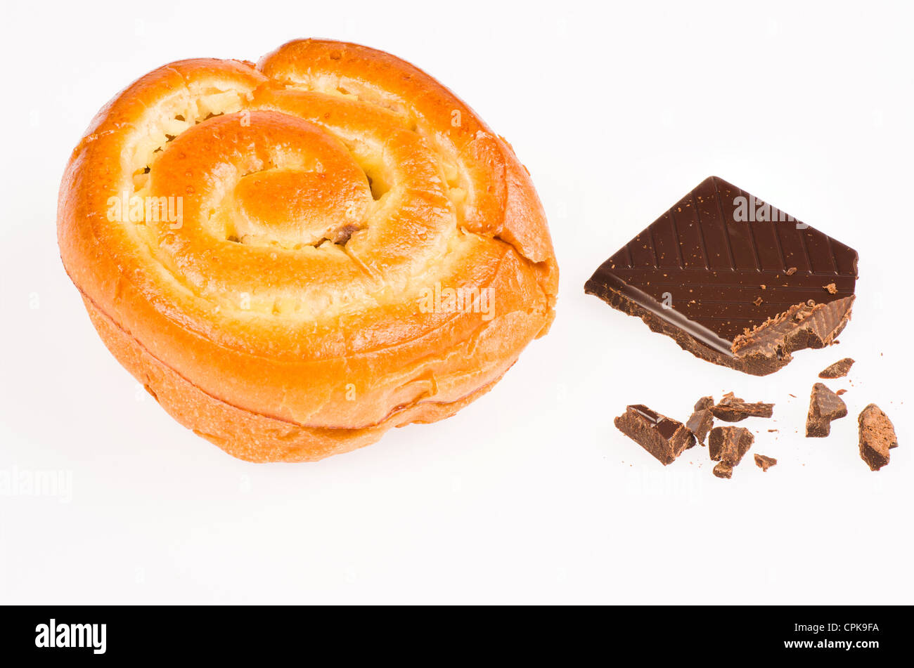 Chocolate brioche with some chocolate splinters next to it Stock Photo ...
