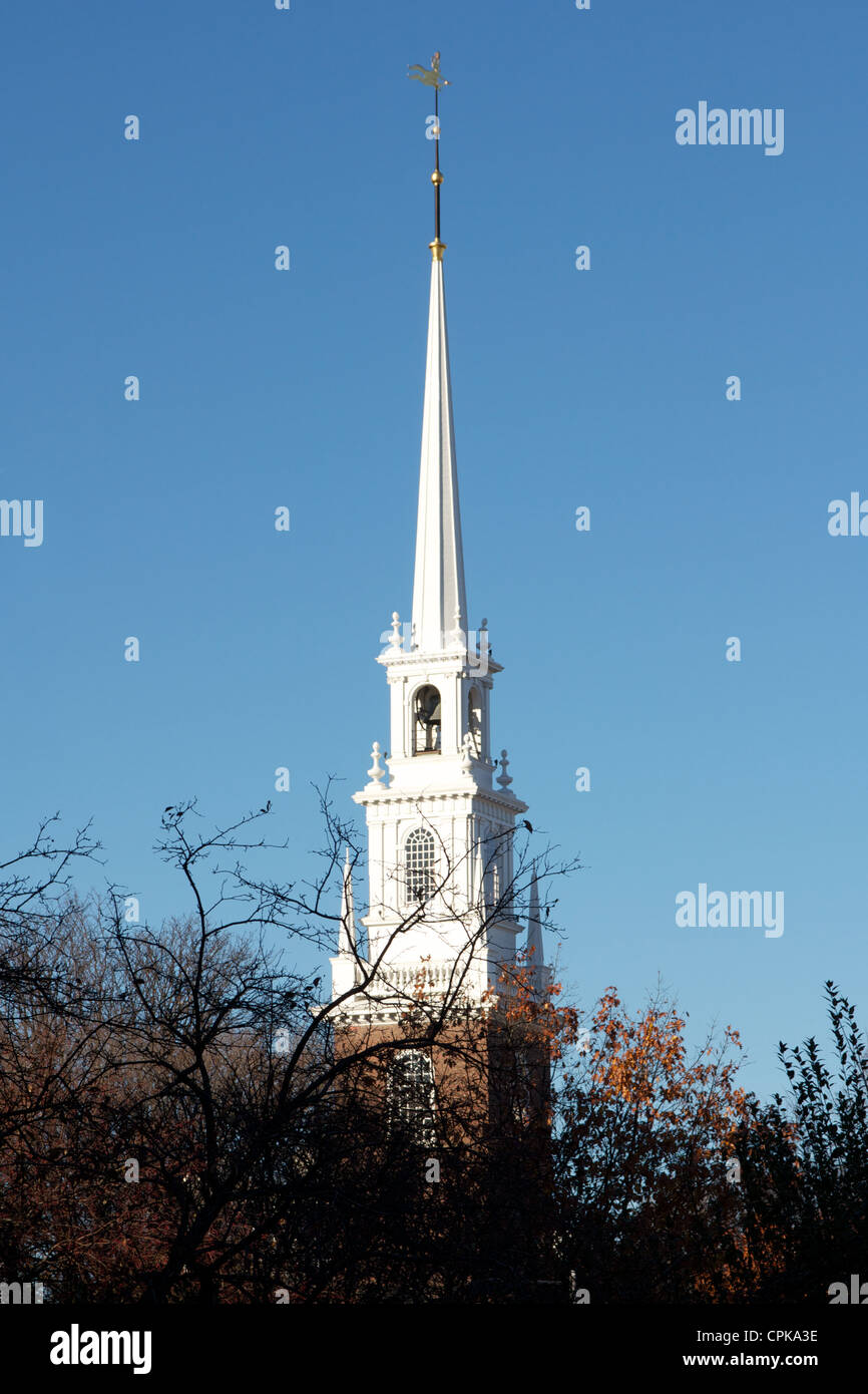 The church steeple of Harvard's Memorial Church brightly lit by the sun ...
