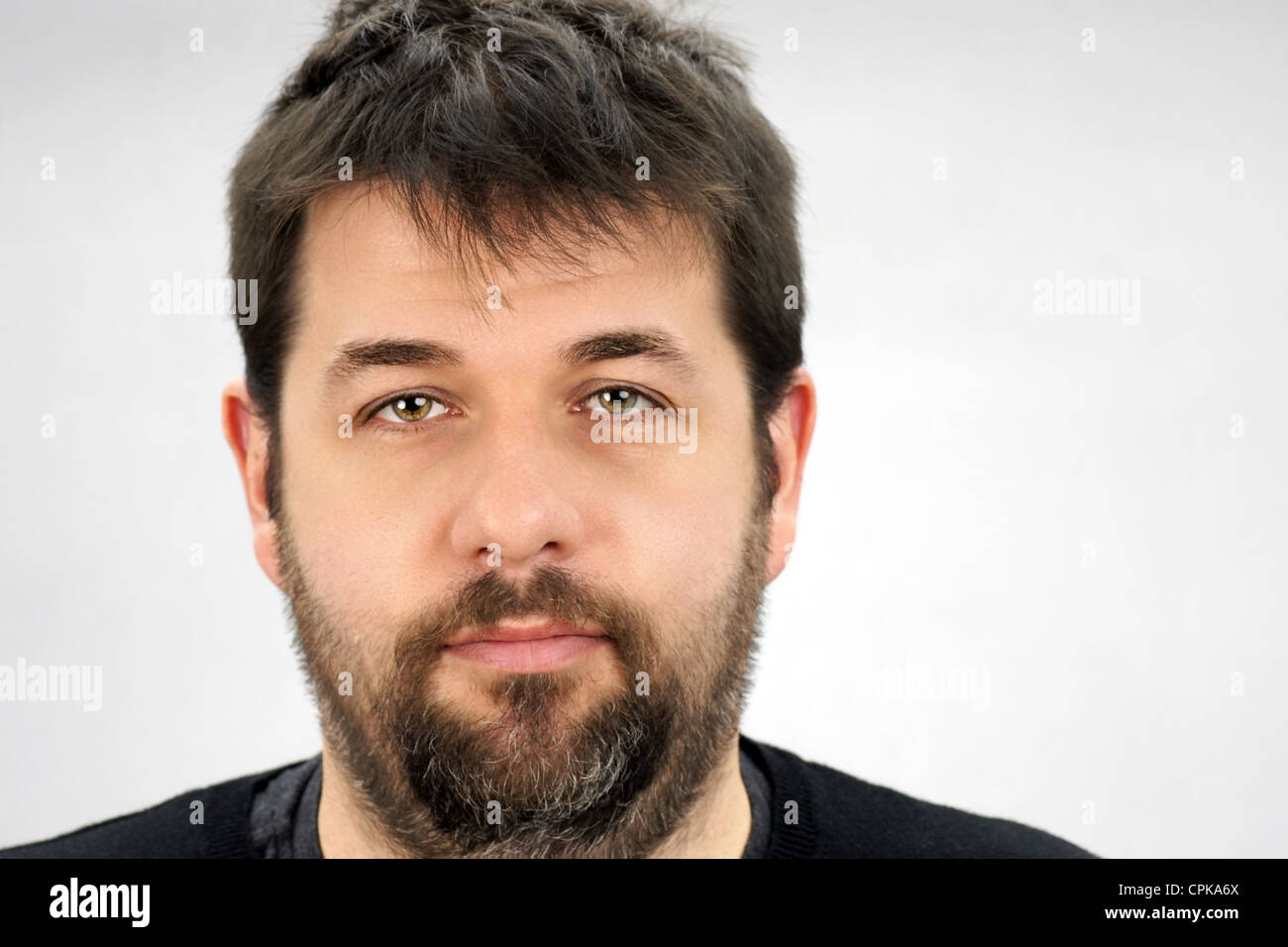 Portrait of a smiling, friendly dark hair ordinary middle age man over ...