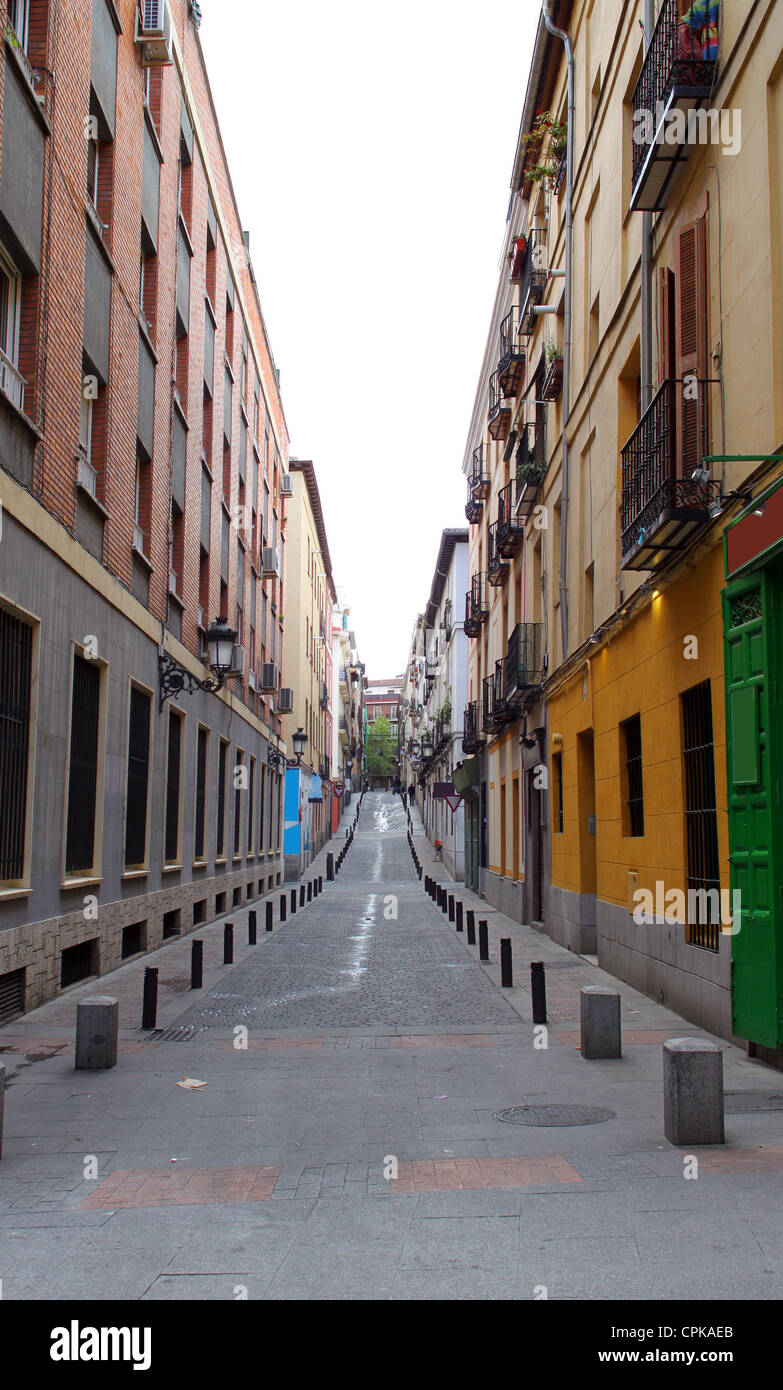Narrow alley with colorful facades in downtown of Madrid, Spain Stock ...