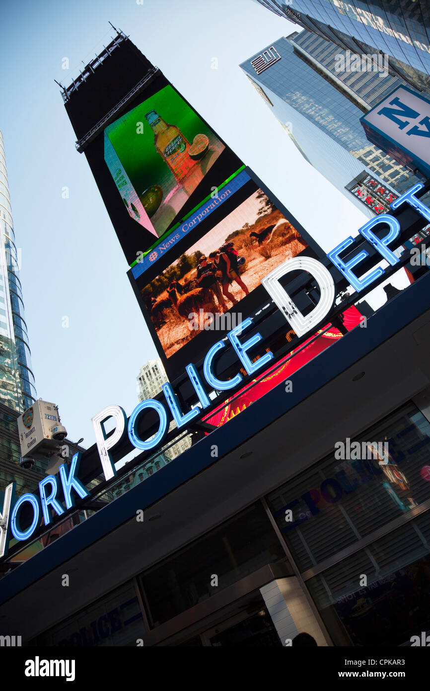 New York City, Manhattan, Times Square at dusk NYPD police dept ...