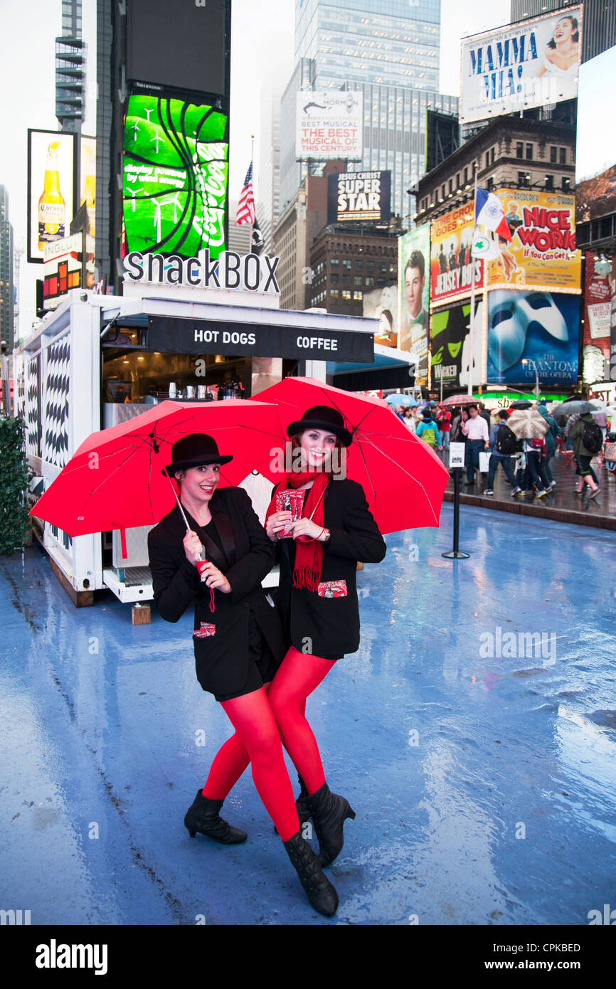 Dancing girls advertising & handing out leaflets for tickets for hit ...