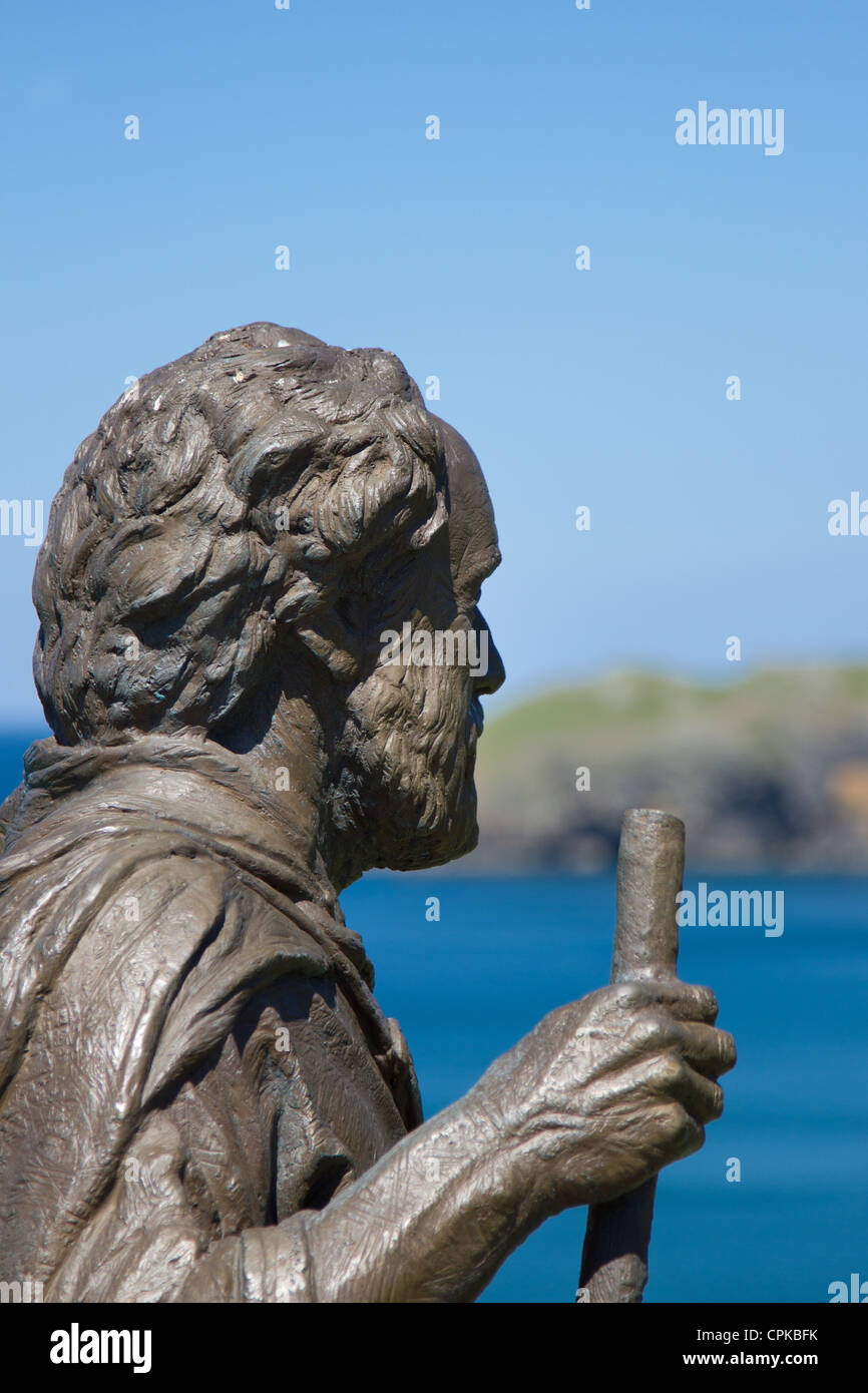 Statue of St Caranog ovelooking the bay at Llangrannog on the ...