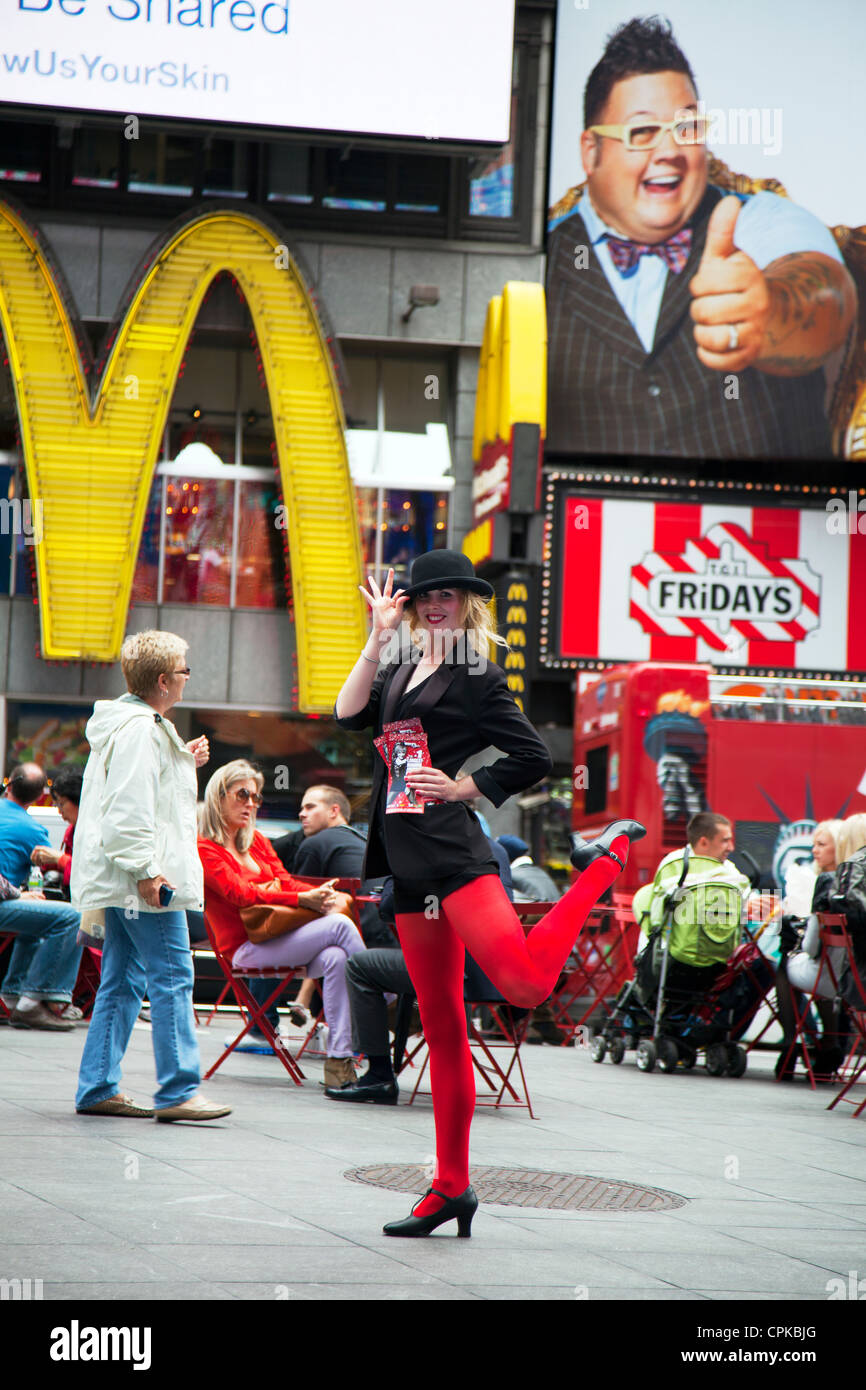 Dancing girl advertising handing out leaflets times square new york hi ...