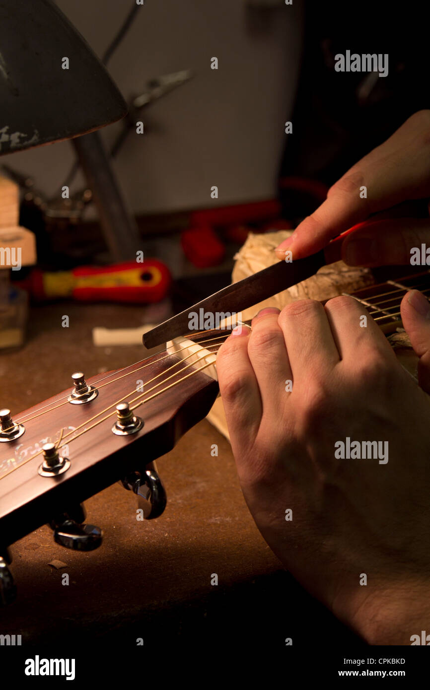 Guitar repair hi-res stock photography and images - Alamy