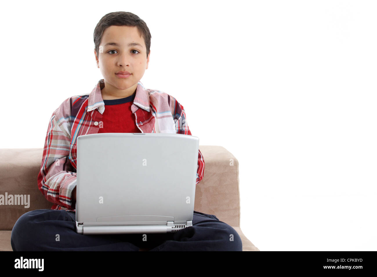 Picture of a boy on computer set on white background Stock Photo - Alamy