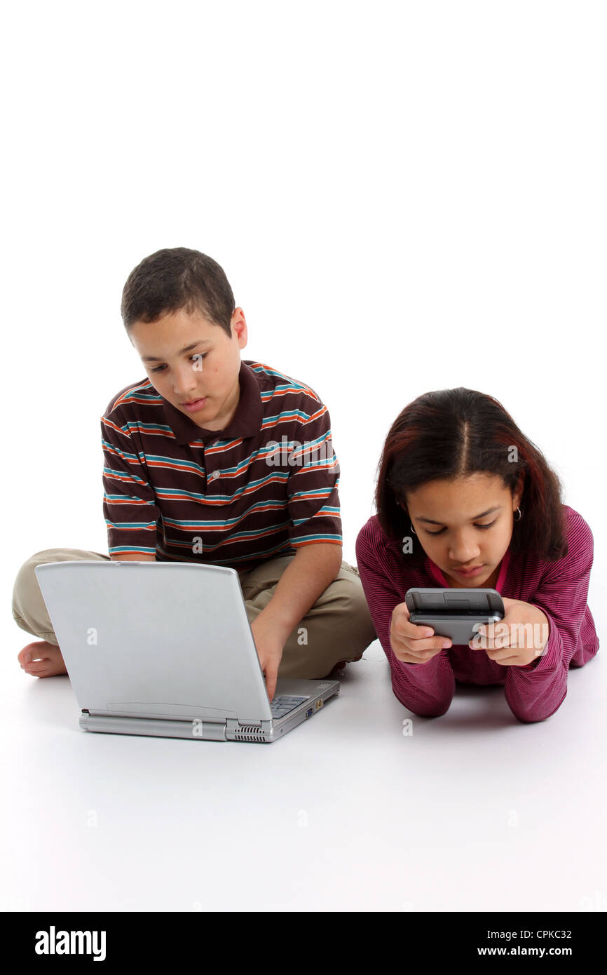 Picture of children on computer and cell phone set on white background ...