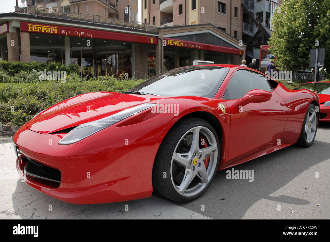RED FERRARI 458 CAR & STORE MARANELLO ITALY 08 May 2012 Stock Photo - Alamy