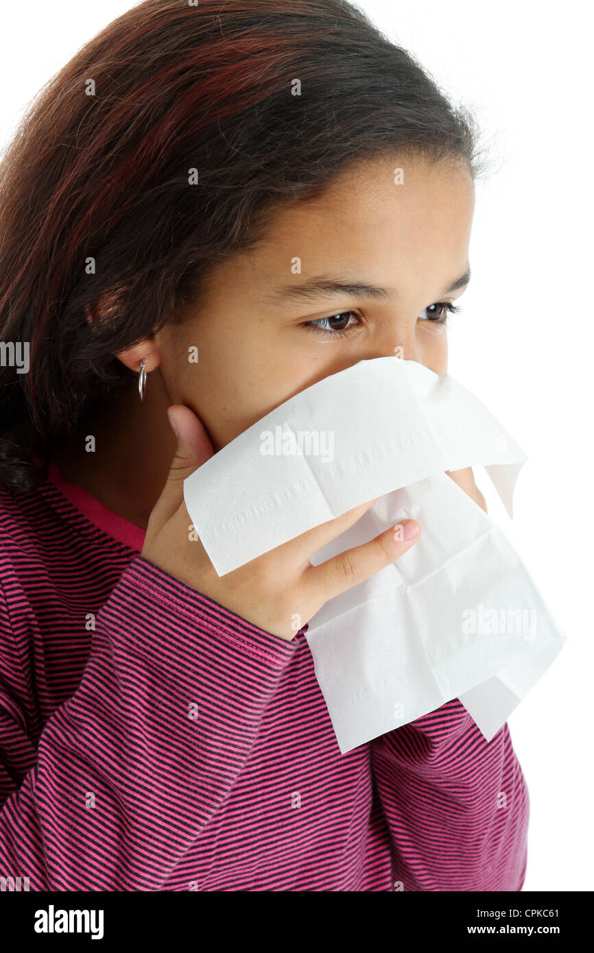 A young girl with tissue and a cold Stock Photo - Alamy