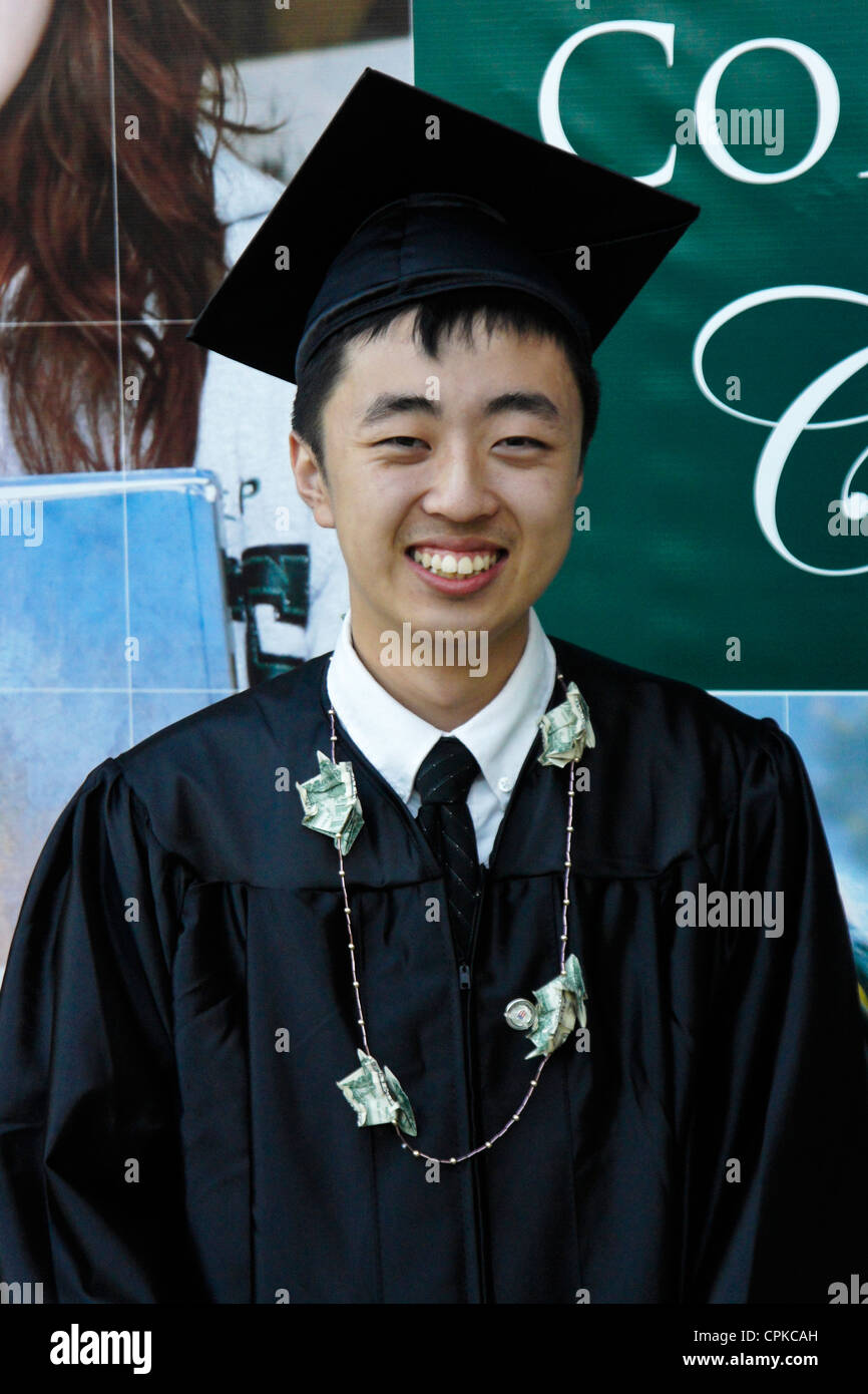 Chinese boy graduating from high school in United States Stock Photo ...