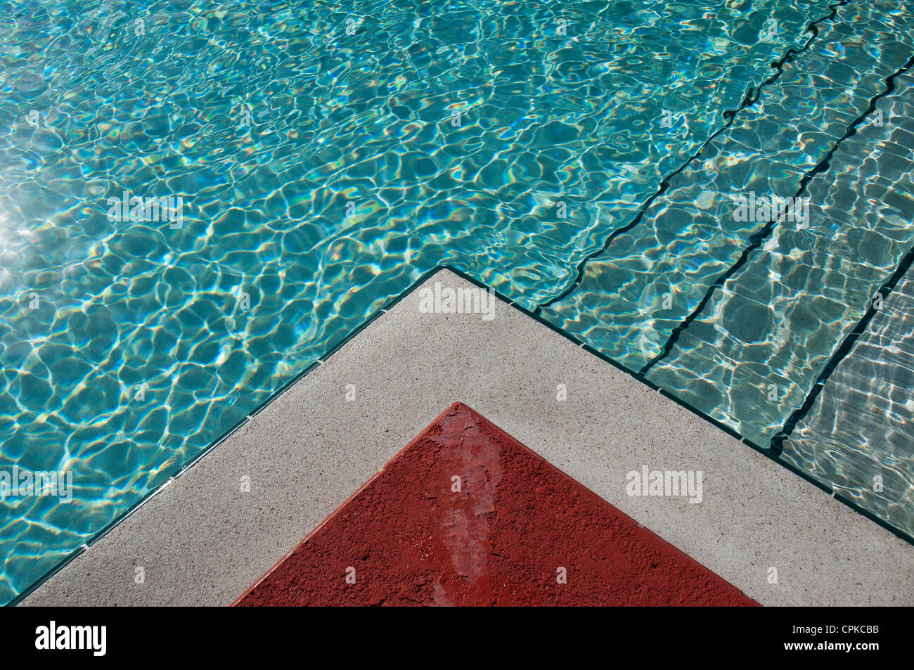 Sunny day at a swimming pool Stock Photo - Alamy