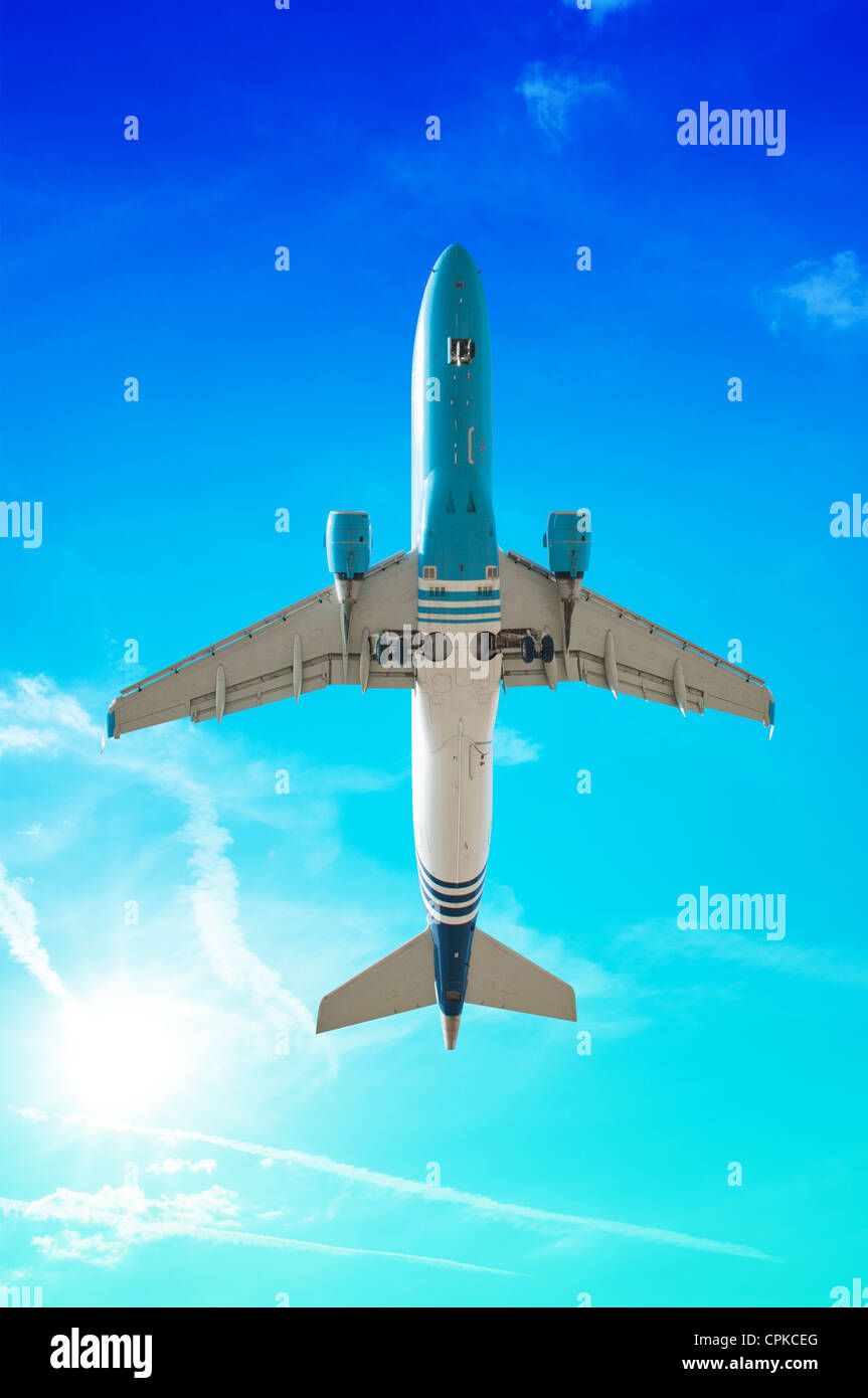 Airplane flying in the air Stock Photo - Alamy