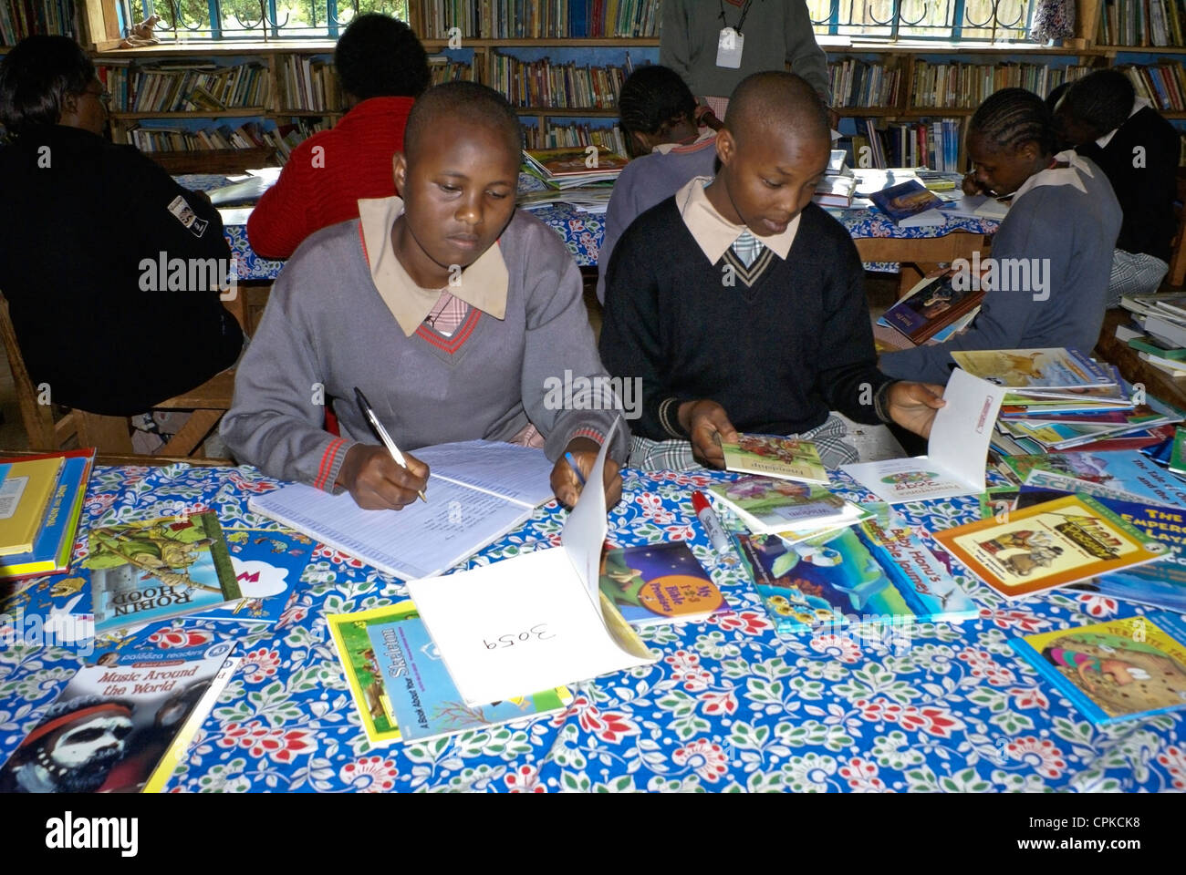 Students (girls) working in school library, Kenya Stock Photo - Alamy