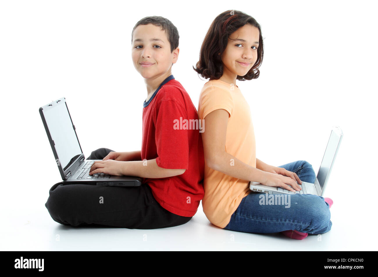 Picture of children on computer set on white background Stock Photo - Alamy