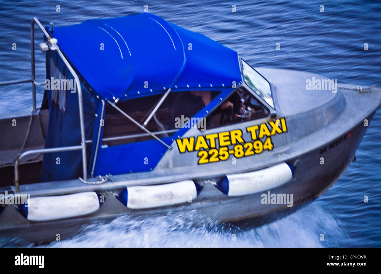 Water taxi skipper hi-res stock photography and images - Alamy