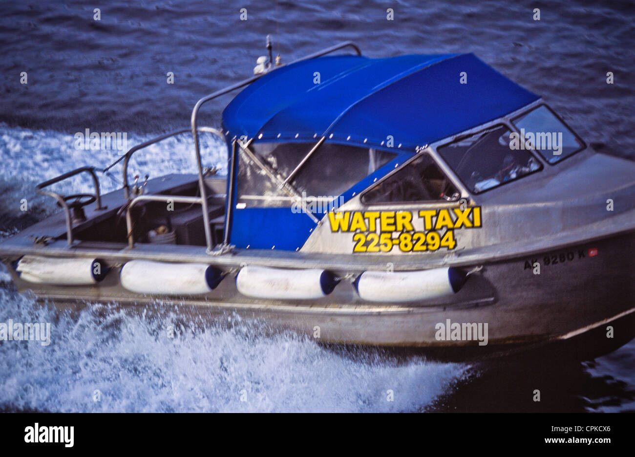 Water taxi skipper hi-res stock photography and images - Alamy