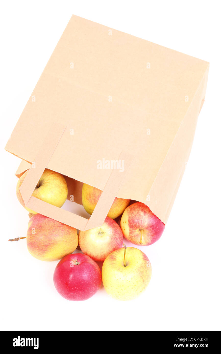 Shopping brown recycle gift bags and red apple isolated on white ...