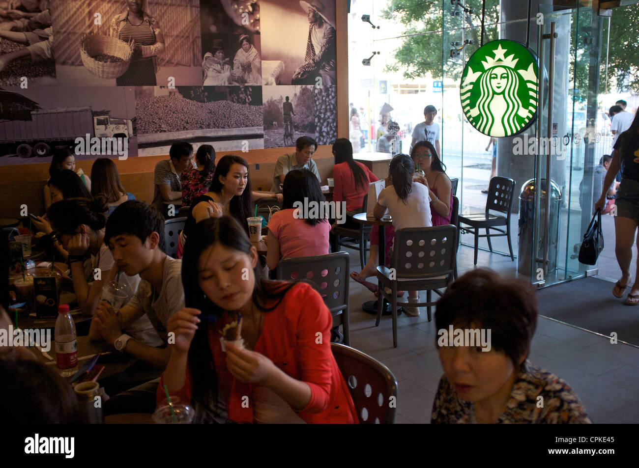 A Starbucks coffee shop in downtown Beijing, China. 25-May-2012 Stock ...