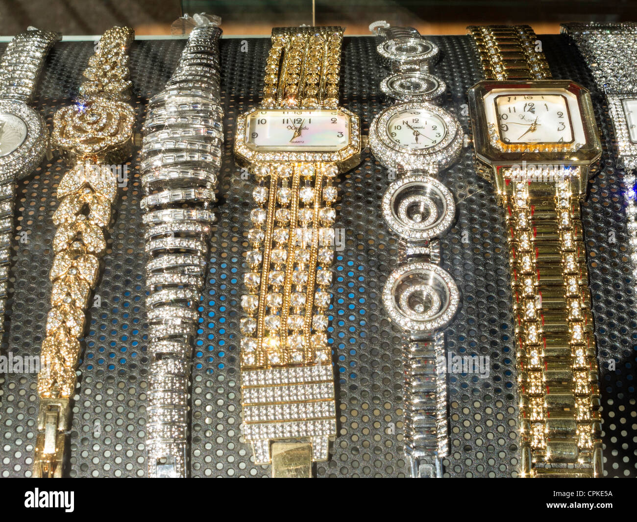 Watch display in shop window Stock Photo - Alamy