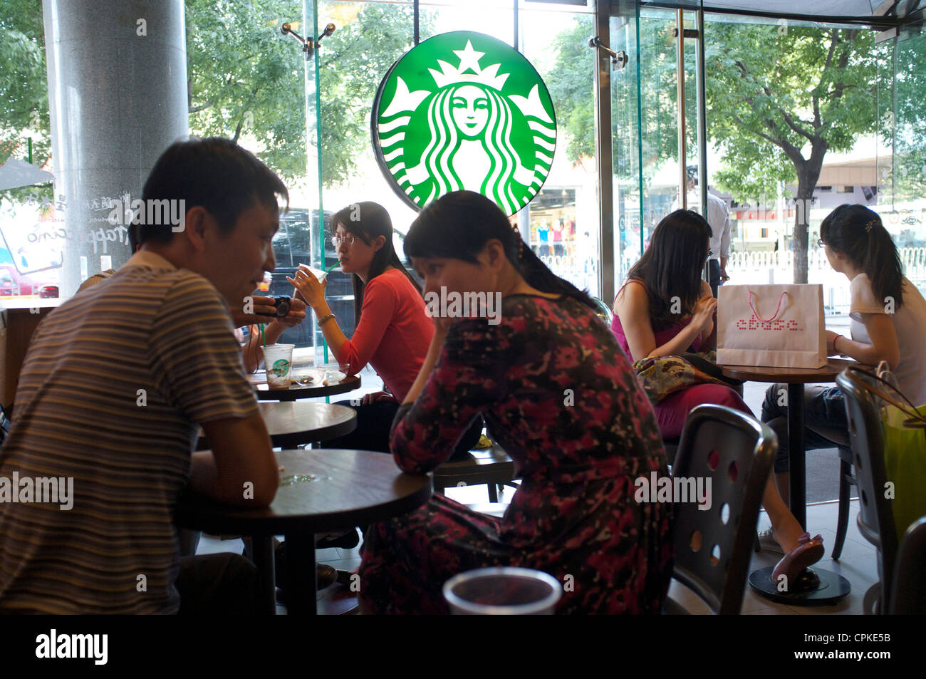 A Starbucks coffee shop in downtown Beijing, China. 25-May-2012 Stock ...