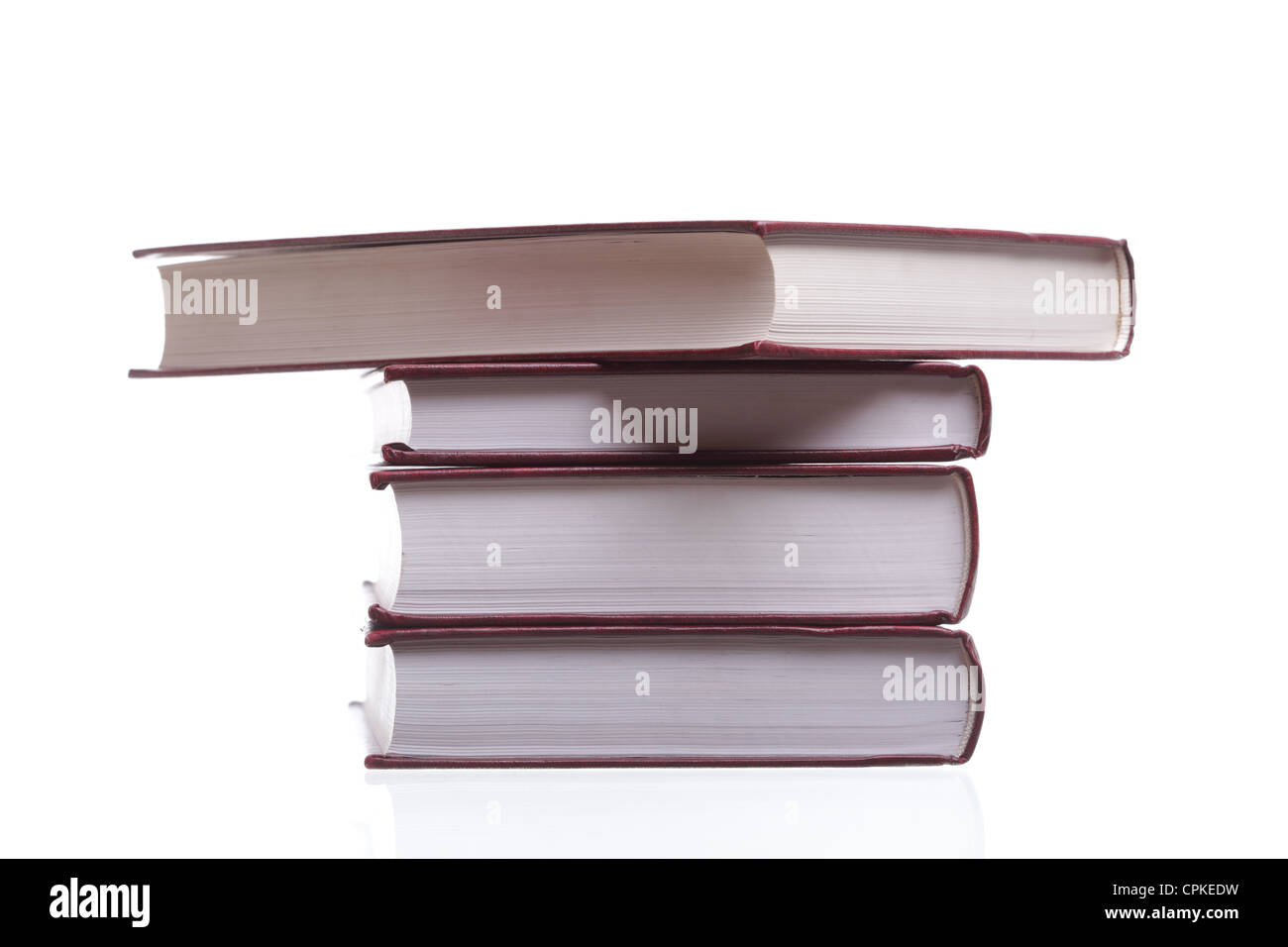Isolated on white stack red book library object Stock Photo - Alamy