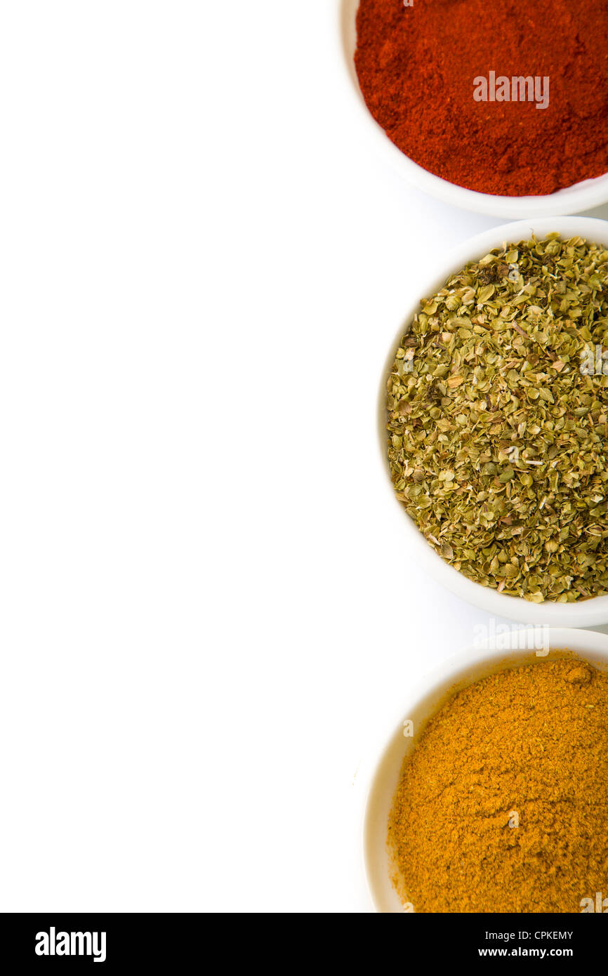 Colorful spices in white pods isolated on white Stock Photo - Alamy