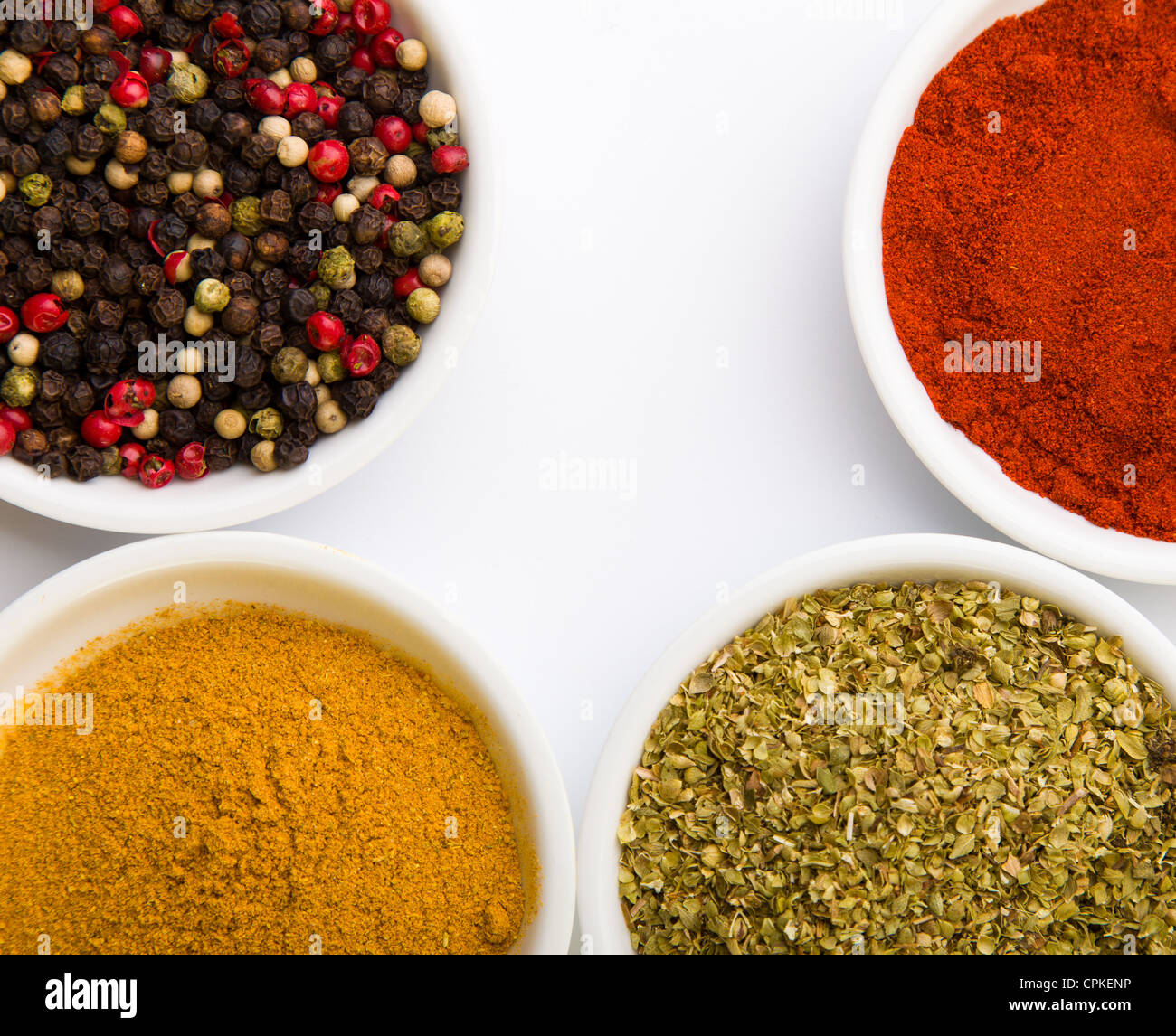 Colorful spices in white pods isolated on white Stock Photo - Alamy