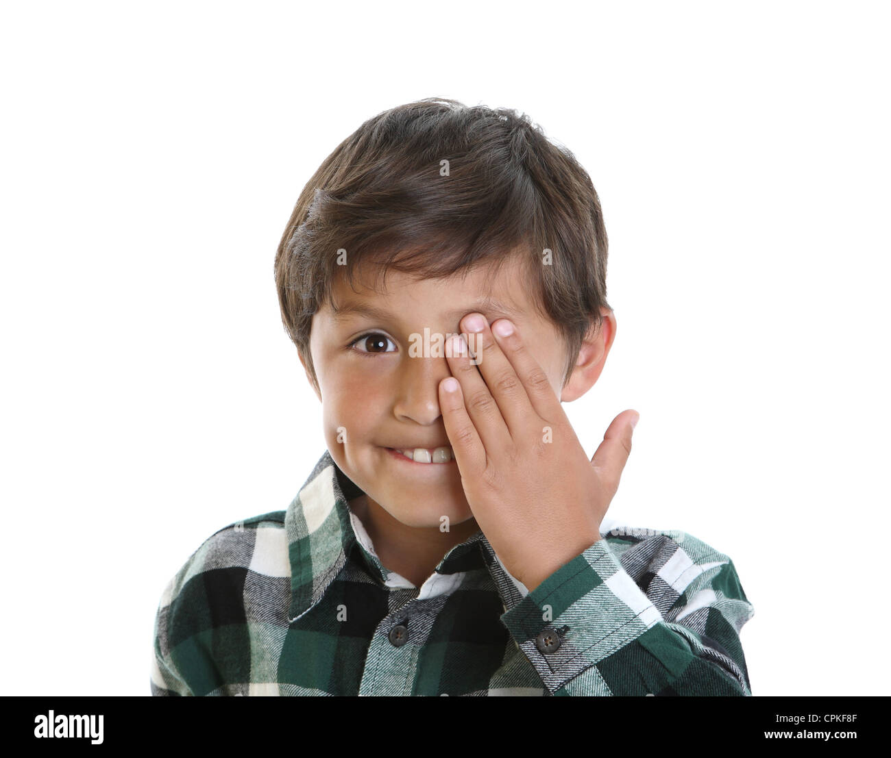 Happy smiling young boy covers one eye Stock Photo - Alamy
