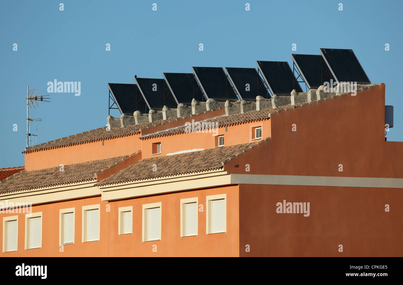 Residential building with solar panels on the roof Stock Photo - Alamy
