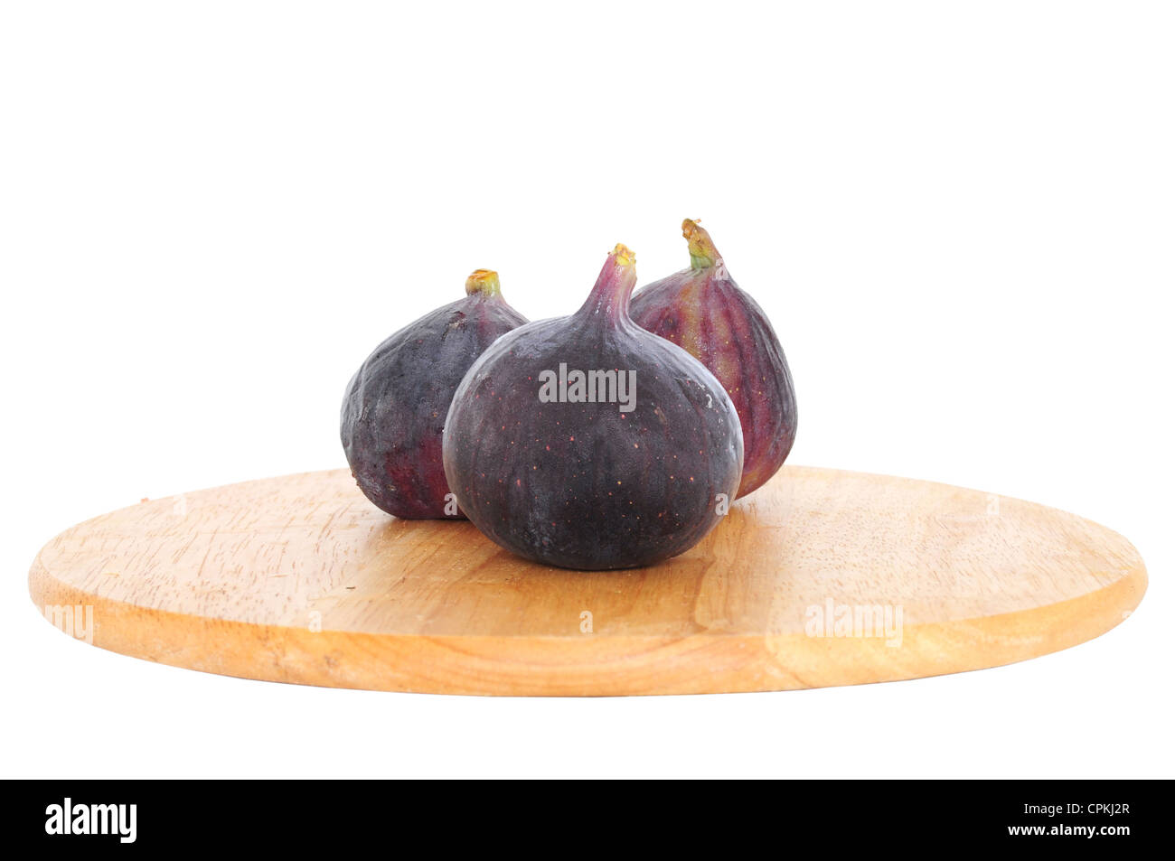 Fresh whole figs on wooden board isolated onwhite background Stock ...