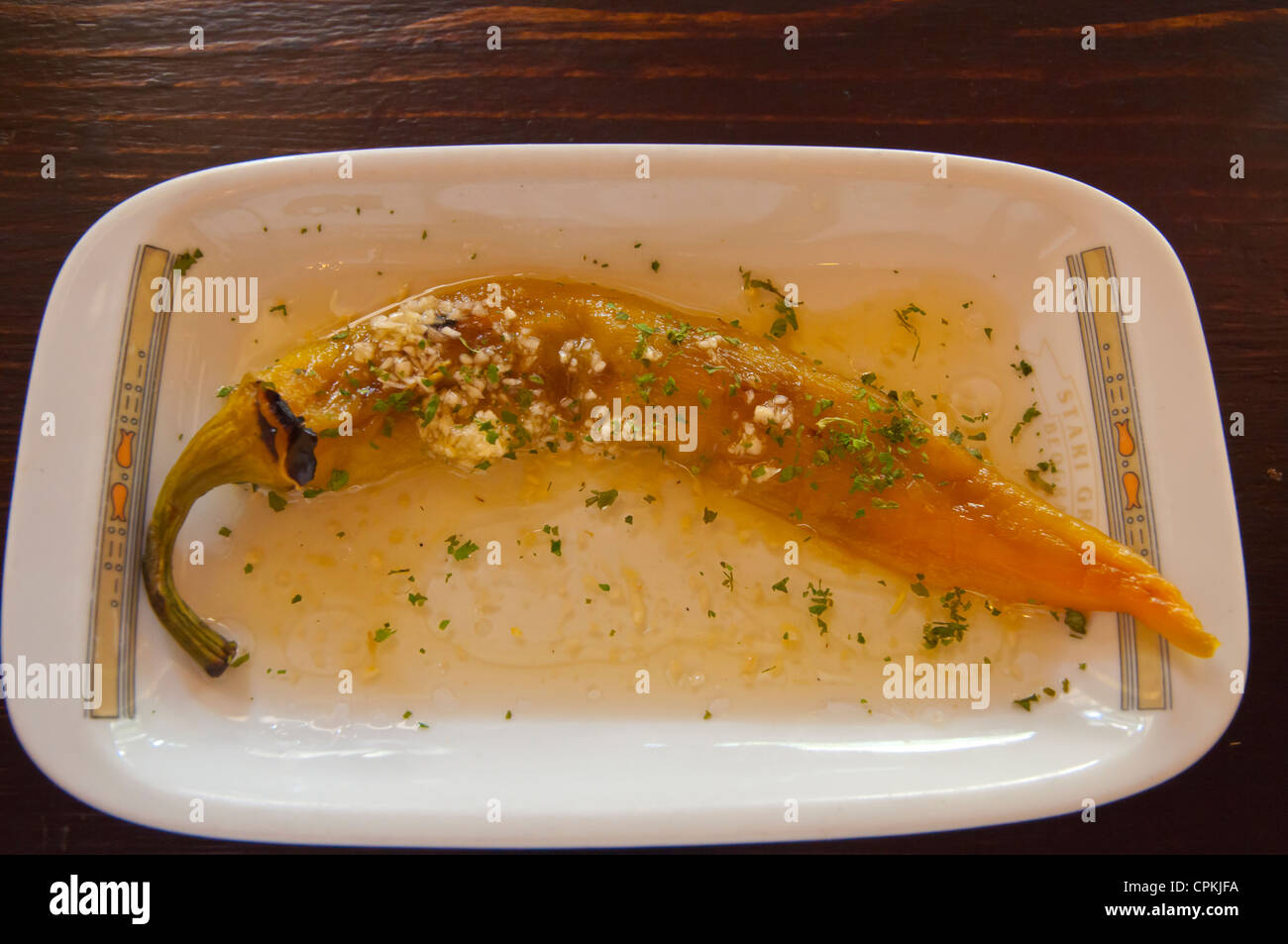 Spicy Serbian pepper marinated with olive oil and garlic in a ...